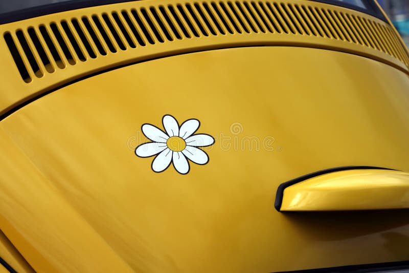 While Flower Sticker at Old Yellow Car Stock Photo - Image of view ...
