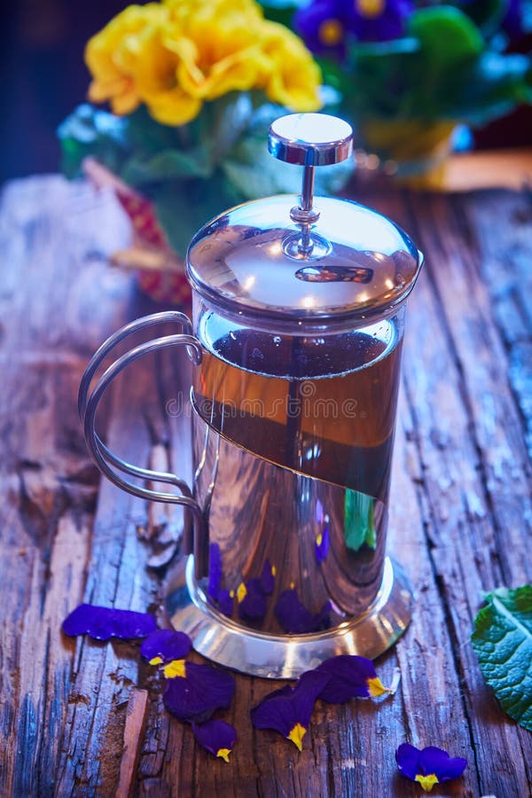 Flower Tea in Glass Pot on a Wooden Table. Stock Image - Image of ...