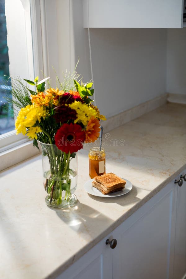 Flower Vase and Breakfast on Worktop in Kitchen Stock Photo - Image of ...