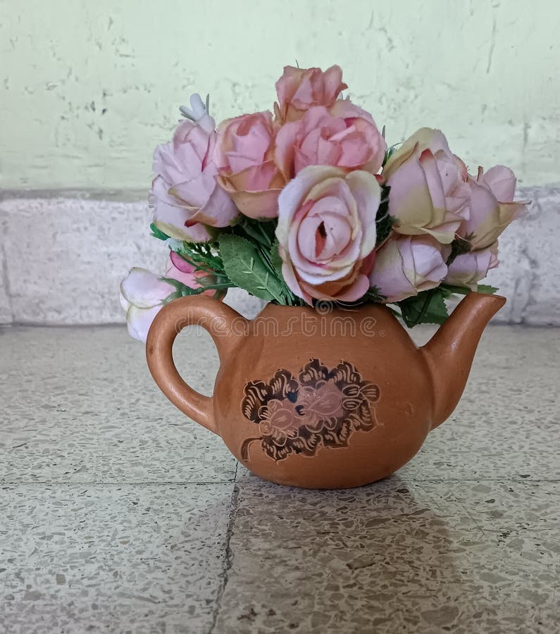 A Flower Vase Made from Teapot Stock Photo - Image of teapot, plant ...