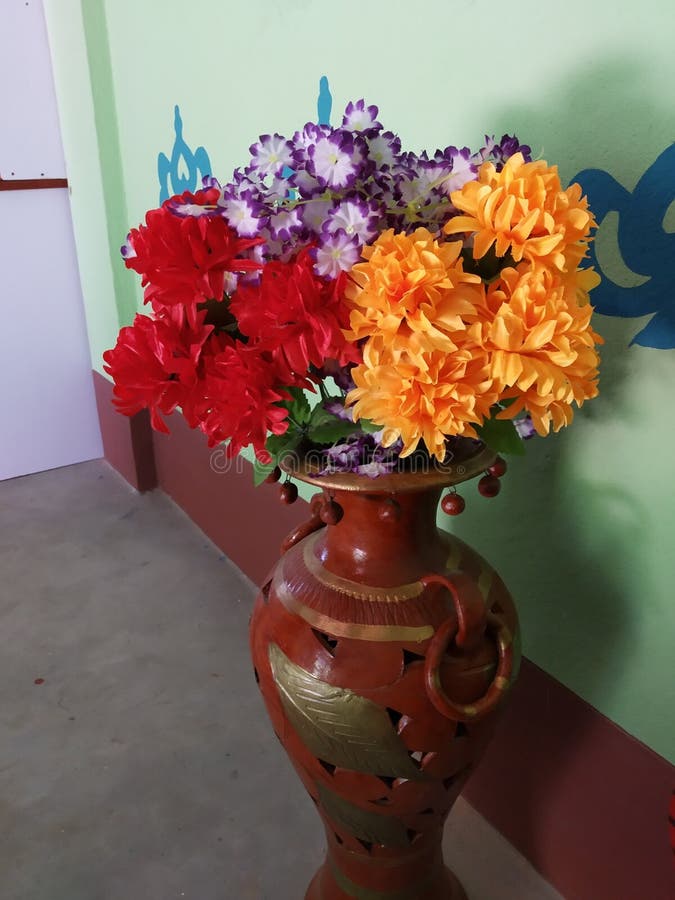 Flower Vash with Bright Colors Flower Yellow Rewards Mud Vash Stock ...