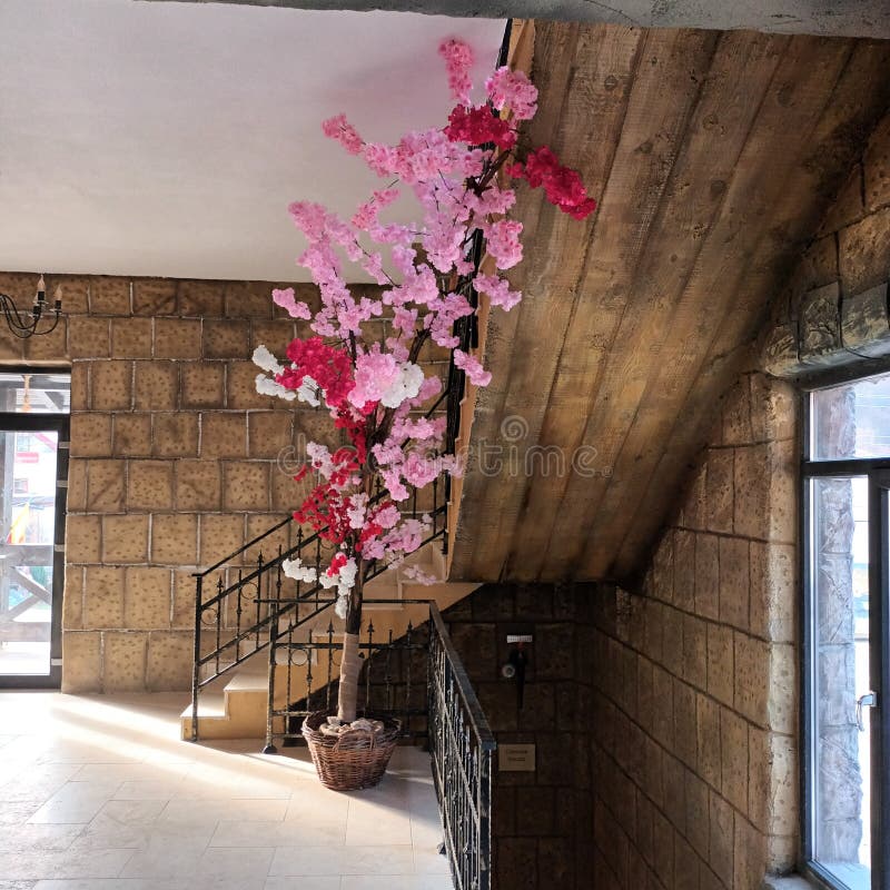 A Flowering Corner. Flowering Artificial Tree Decorating the Interior ...