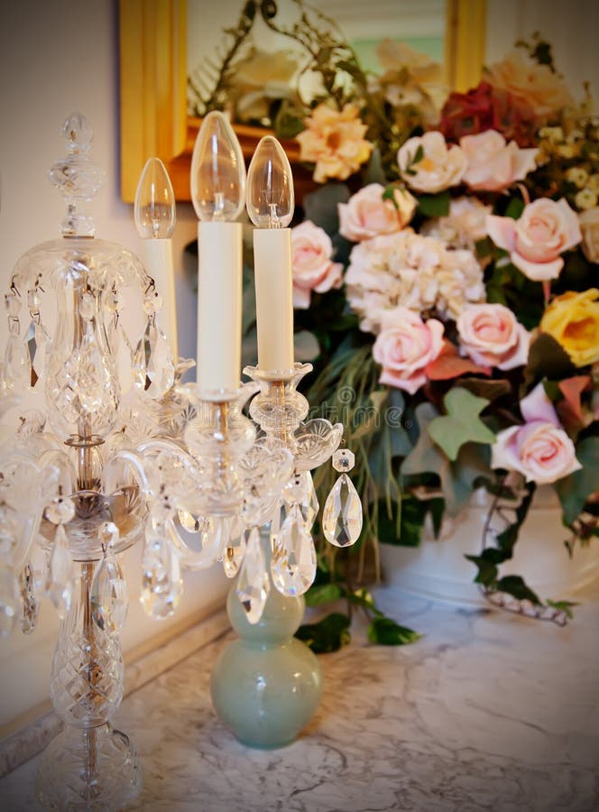Flowers and candelabre stock image. Image of luxury, elegant - 23024625