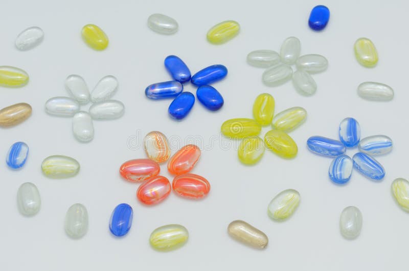 Flowers of Colored Glass Stones on a White Surface. Stock Photo - Image ...