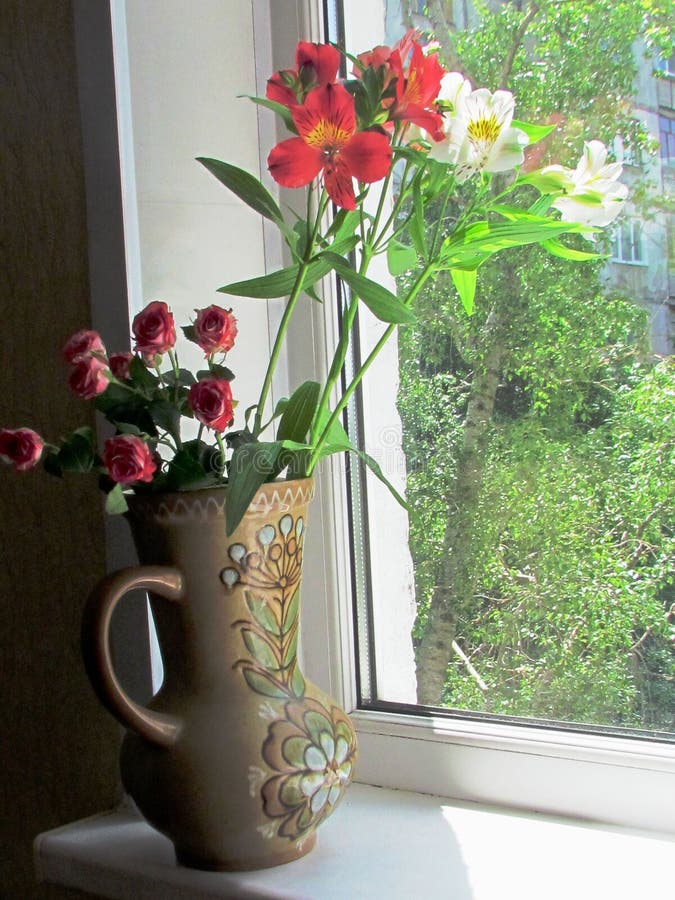 Flowers in jug stock photo. Image of green, pictured - 93268566