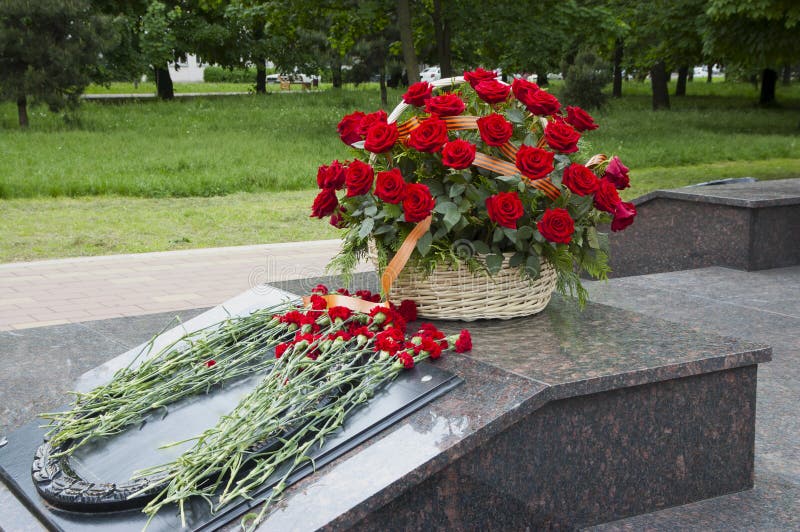 Flowers at a monument stock photo. Image of plant, burial - 116469700