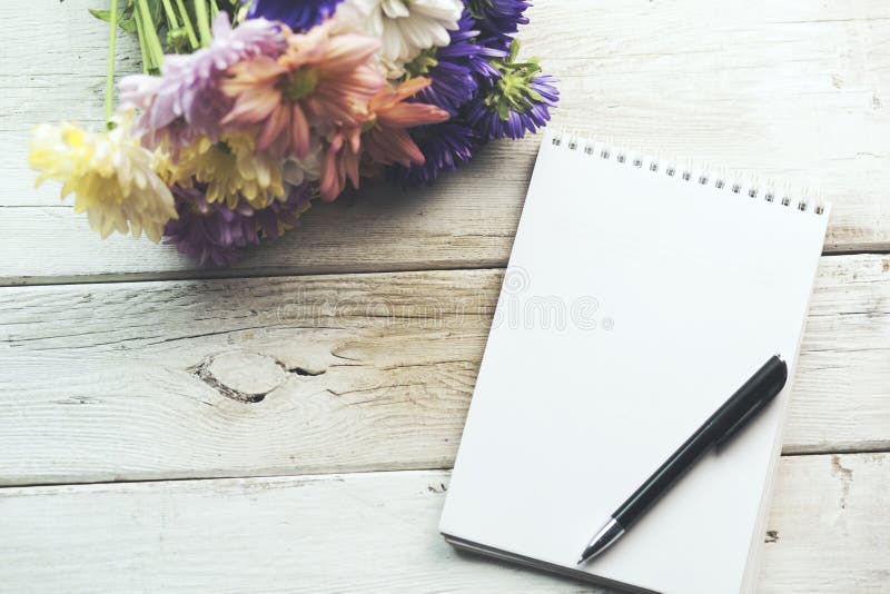 Flowers and notepad stock image. Image of ring, personal - 138102957