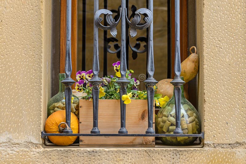 Flowers and Pumpkin on a Window with a Lattice of an Old House Stock ...