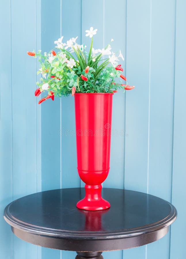 Flowers in red vase stock photo. Image of isolated, background - 177998010