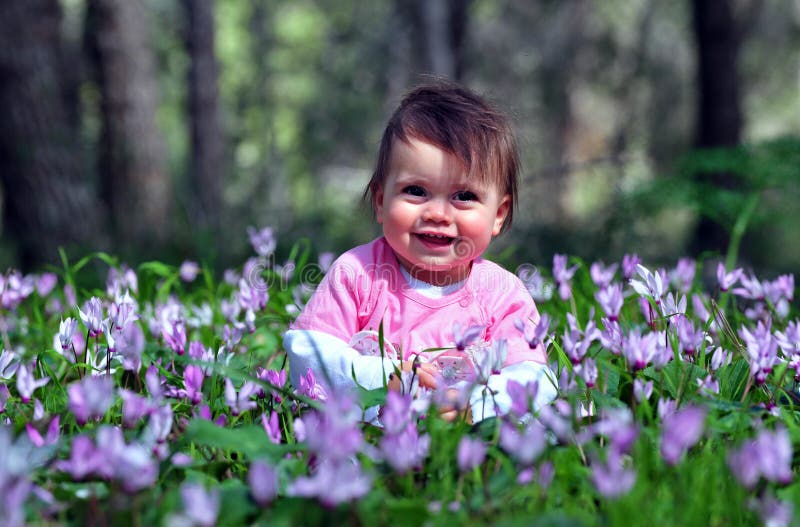 Spring baby in daffodils stock photo. Image of colours - 23845476