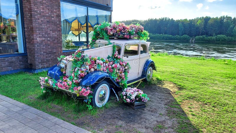Flowers Sprout from the Interior of an Old Retro Car Stock Image ...