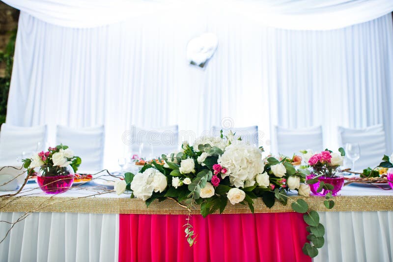 Flowers on Vase with Pink Water at Table of Newlyweds. Stock Image ...
