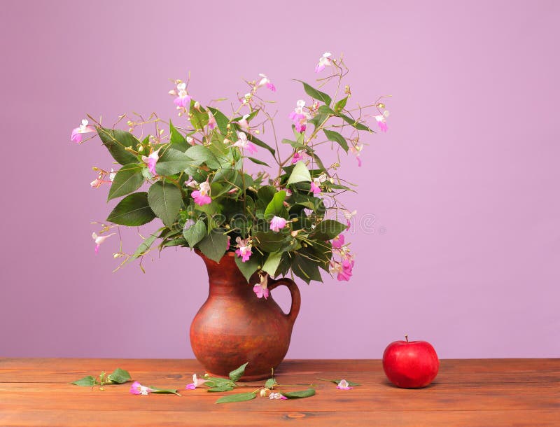 Flowers in a Vase and Red Apple Stock Image - Image of botanical ...