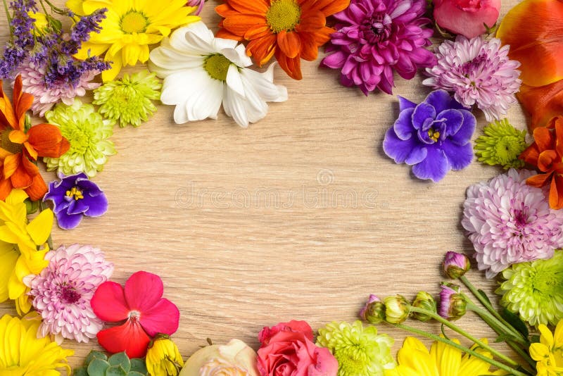 Flowers on wooden table stock image. Image of elegant - 68180219