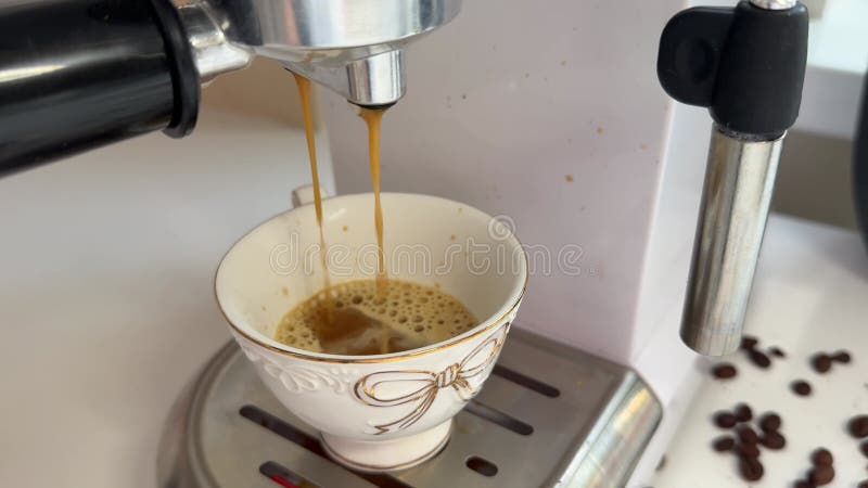 Flowing Coffee from the Machine. Maintenance and Cleanliness are ...