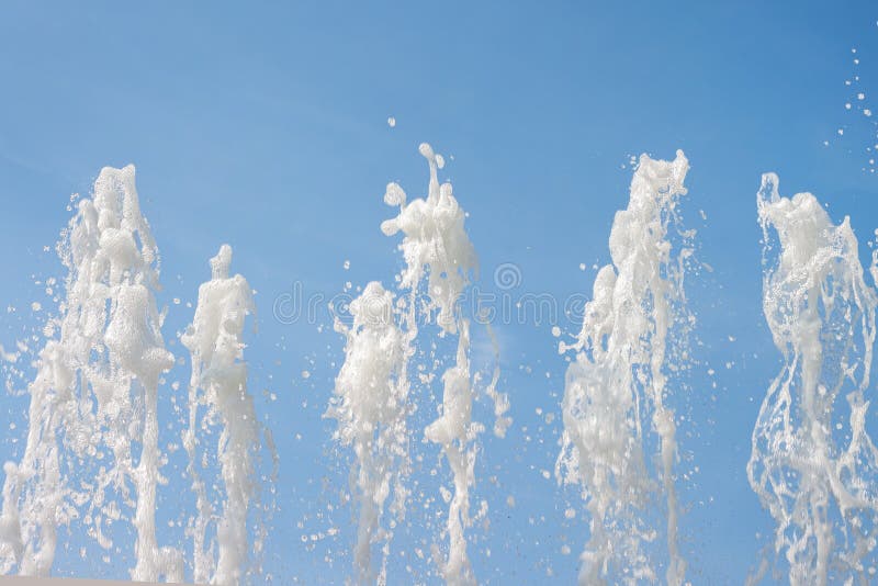 Flowing Fountain Water Jets Spray Texture and Pattern with Blue Sky ...