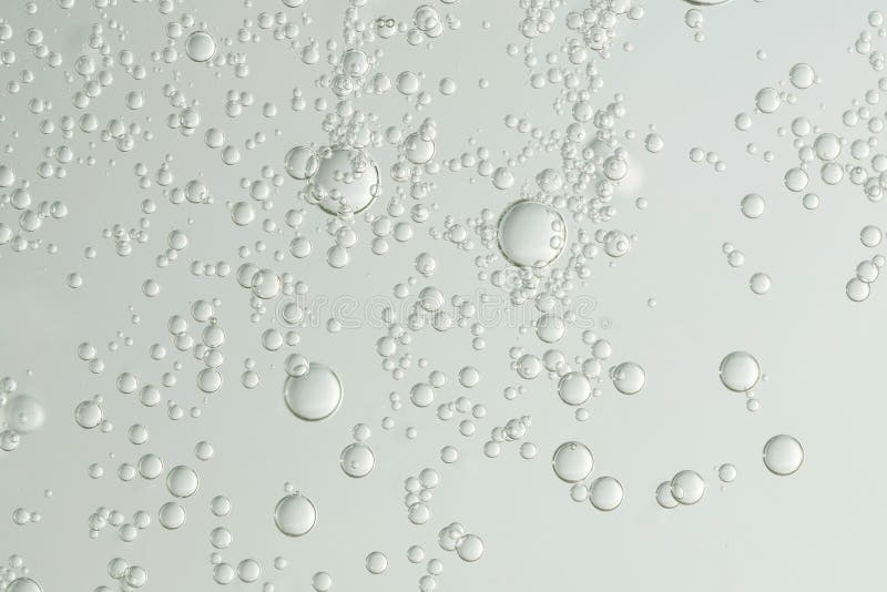 A bubbly liquid surface stock photo. Image of bubbles - 148809418