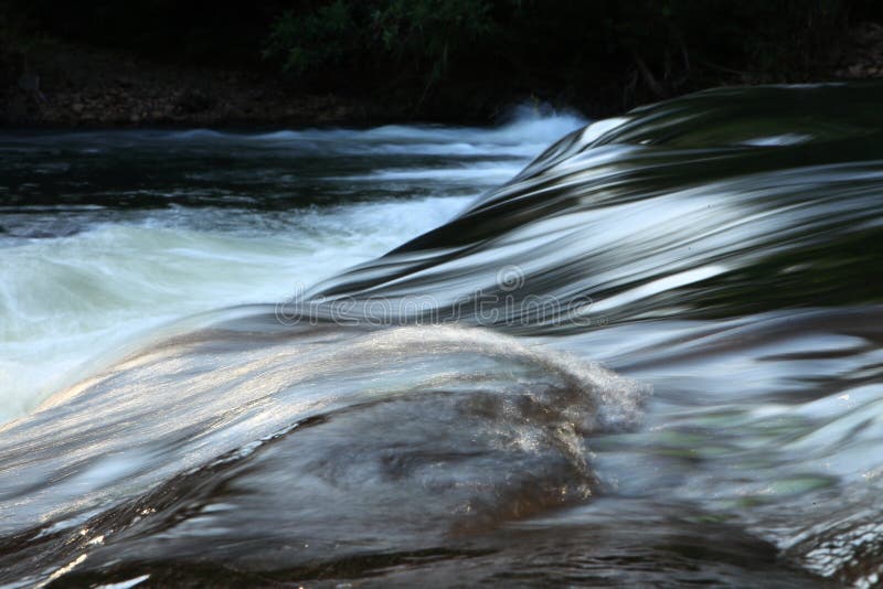 Swiftly Moving River Water Over and Around Large Rocks Winter Landscape ...