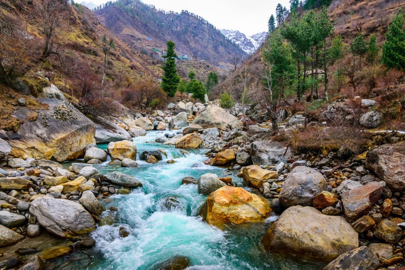 A Flowing River with Rocks on Its Way and by the Sides. Mountain and ...