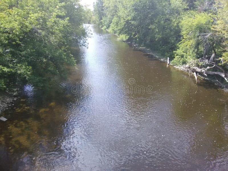 Flowing River stock image. Image of flowing, flow, nature - 123915747