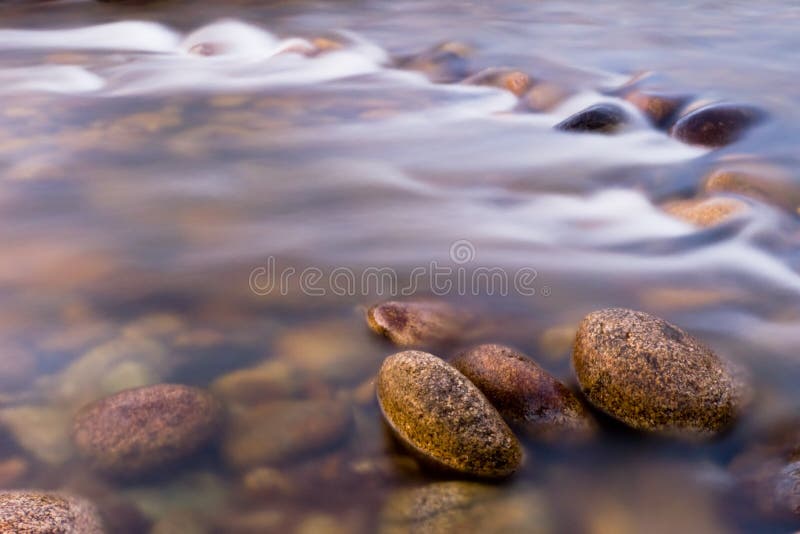 Water Flowing over Stones stock image. Image of background - 2613853