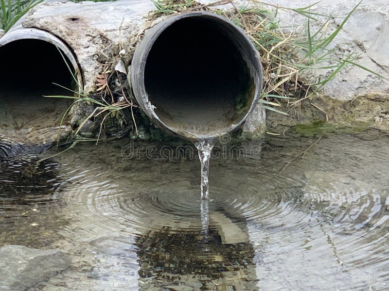 Flowing water stock image. Image of lean, drainage, pipe - 254161021