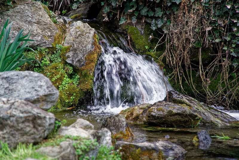 Flowing Water Stream, Water Drops and Reflection Stock Photo - Image of ...
