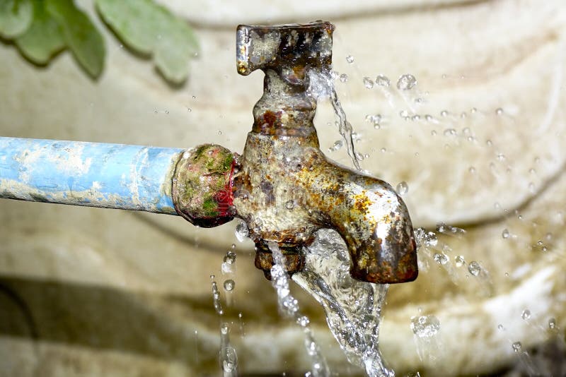The flowing water on tap. stock image. Image of garden - 231136833