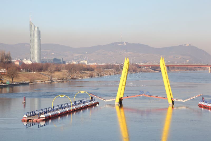 Flowing yellow bridge editorial photography. Image of reflections ...