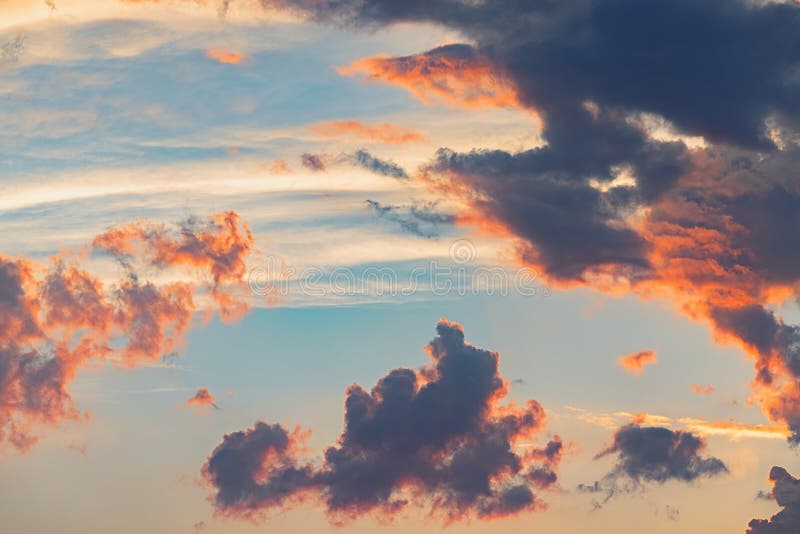 Fluffy Clouds Against Evening Sky at Sunset Stock Image - Image of blue, bright: 256145289