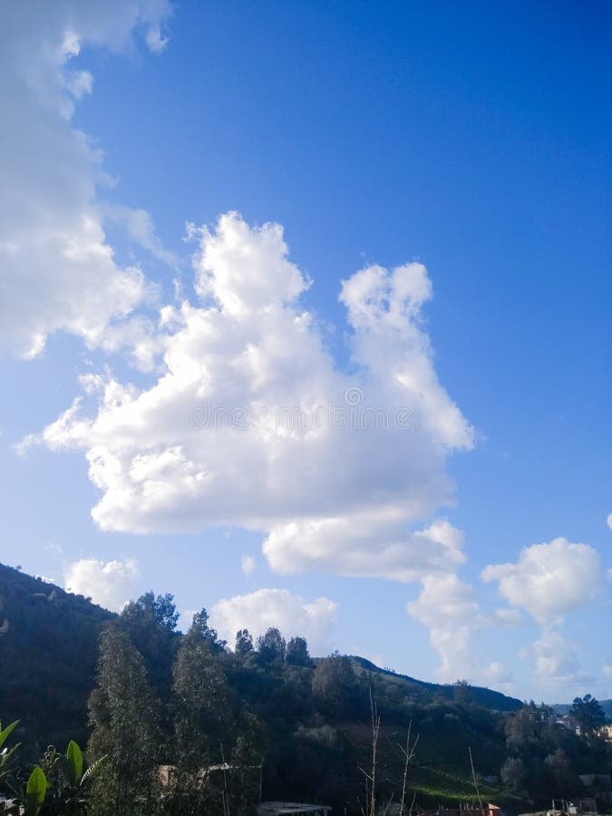 Fluffy Clouds with a Blue Clean Sky Stock Photo - Image of company ...