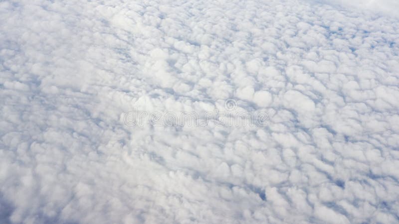 Fluffy Clouds that Looks As Flat Surface As Seen from Commercial ...