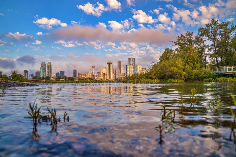Fluffy Clouds Over the Downtown Calgary Bow River Stock Photo - Image ...
