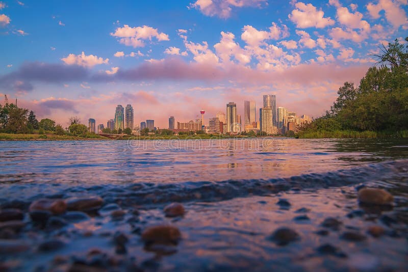 Fluffy Clouds Over the Downtown Calgary Bow River Stock Photo - Image ...