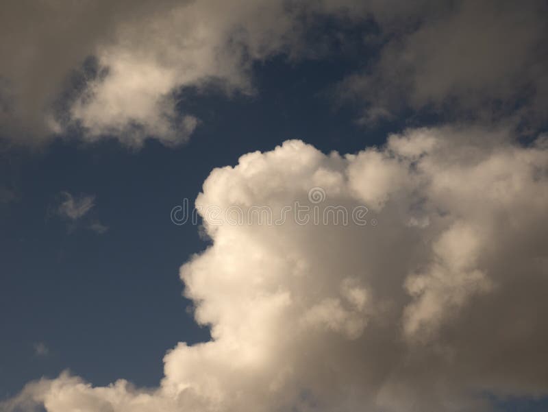 Fluffy Clouds Over Sunset Sky. Fluffy Cumulus Cloud Shape Photo, Gloomy ...