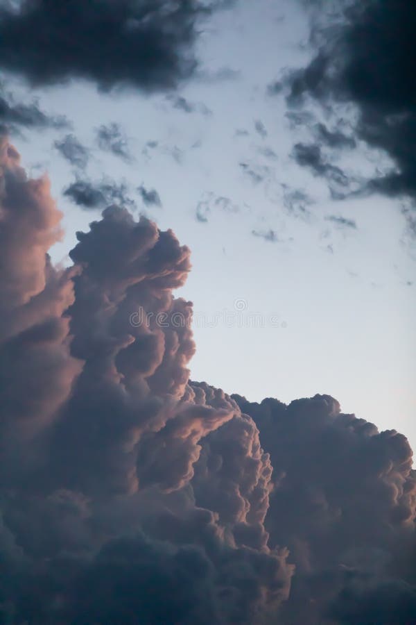 Fluffy Clouds in the Sky with Golden Color from the Sunset Stock Photo ...