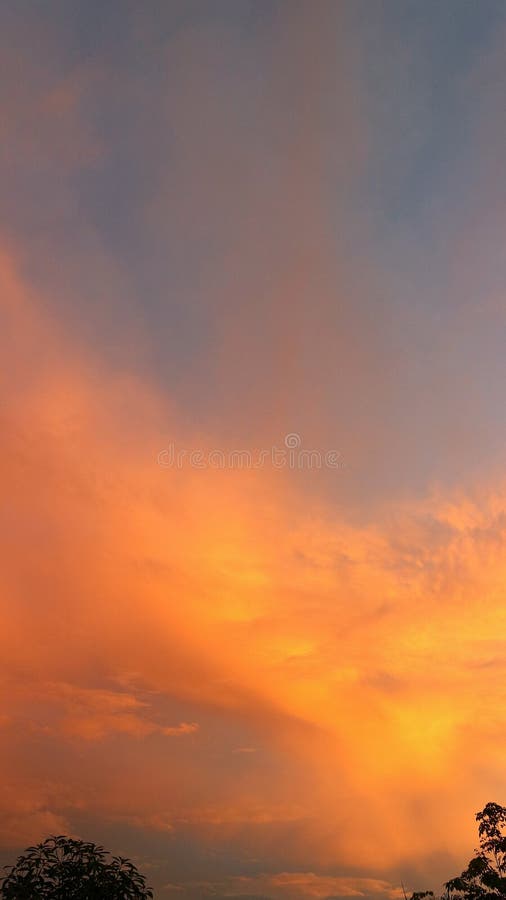 Fluffy Cotton Clounds in the Evening Sky with the Colorful Light Stock ...