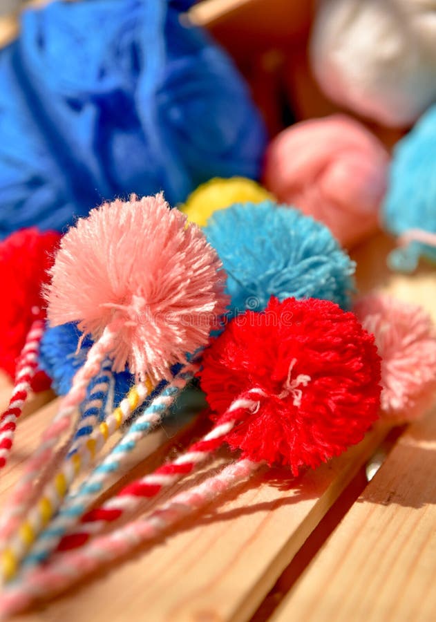 Fluffy Pom Poms with Multi-colored Threads. Stock Photo - Image of ...