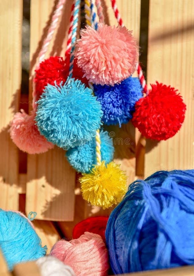 Fluffy Pom Poms with Multi-colored Threads. Stock Photo - Image of blue ...