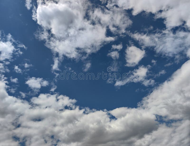 Fluffy White Clouds. the Dark Blue Sky Inside Stock Image - Image of ...