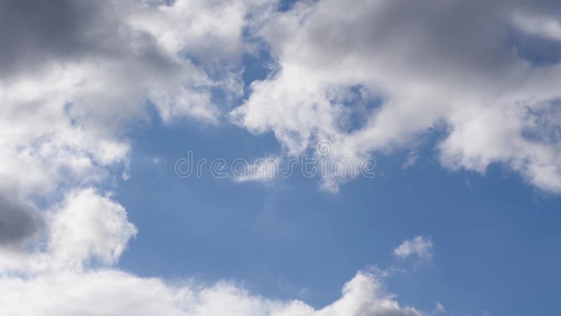 Fluffy White Clouds Moving Across Blue Sky Stock Video - Video of ...