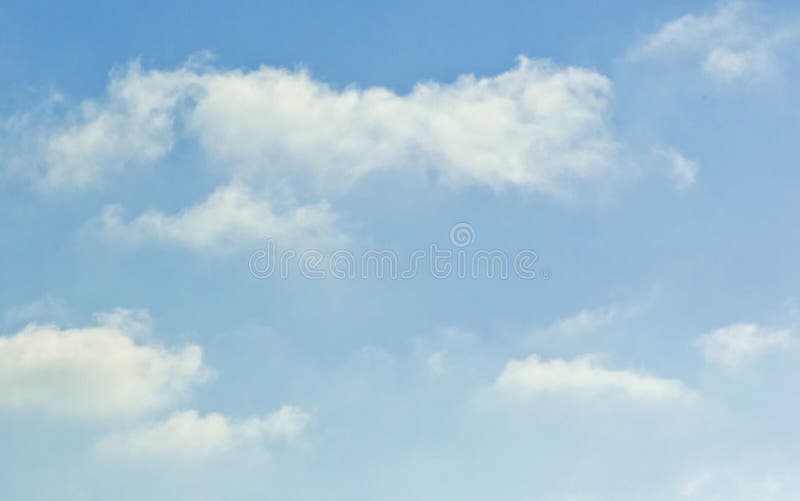 Fluffy white soft clouds stock photo. Image of atmosphere - 76650940