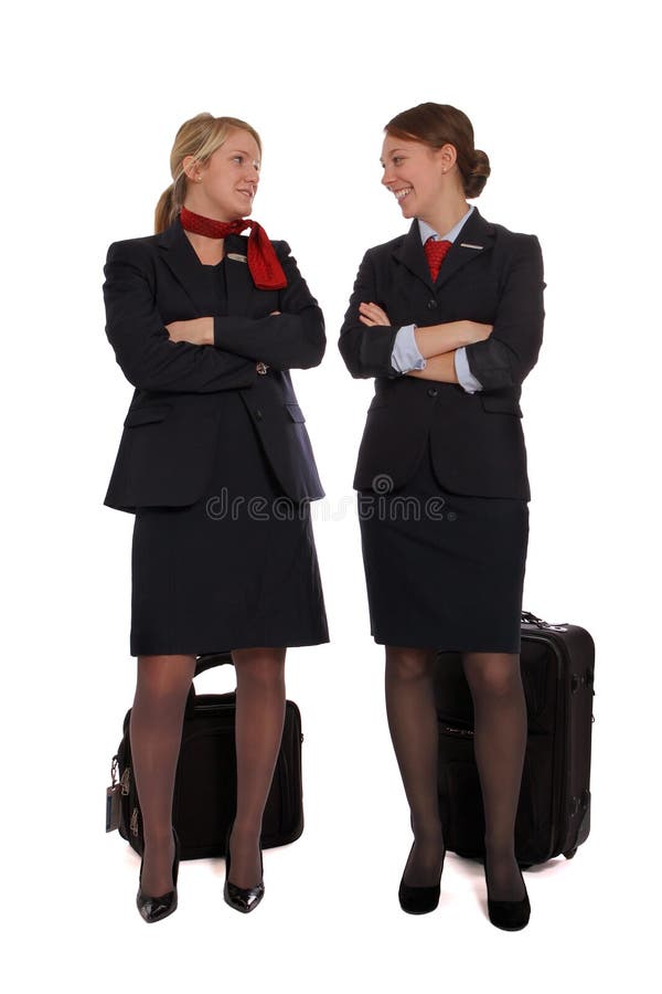 Flugbegleiter im Gespräch stockfoto. Bild von lächeln - 24110620