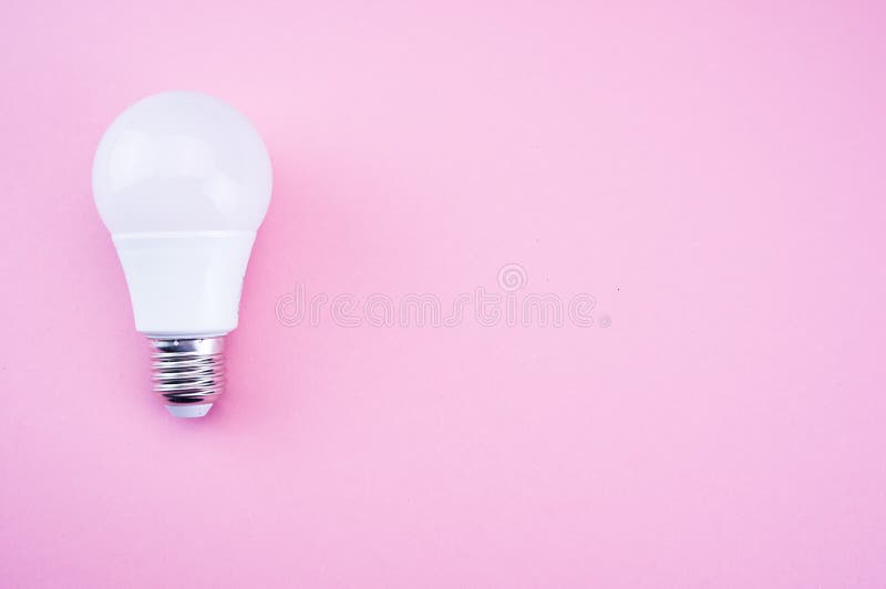 Fluorescent Light Bulb on the Pink Surface Stock Image - Image of pink ...