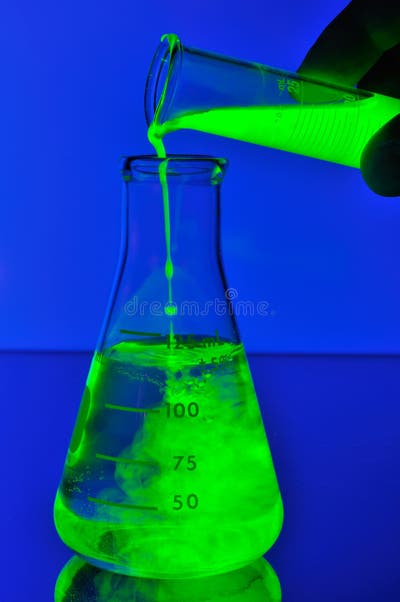 Fluorescent Liquid Falling in Flask Stock Image - Image of stream ...