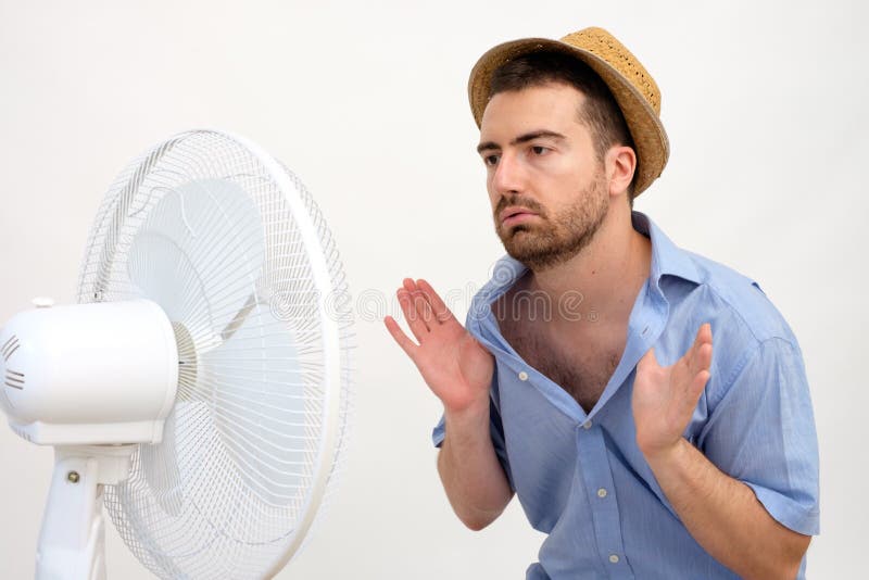 Flushed Man Feeling Hot in Front of a Fan Stock Image - Image of cooler ...