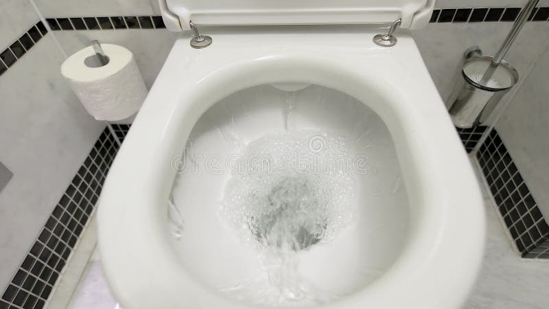 Close-up of Yellow Pee Flushing Down the Toilet Stock Footage - Video ...