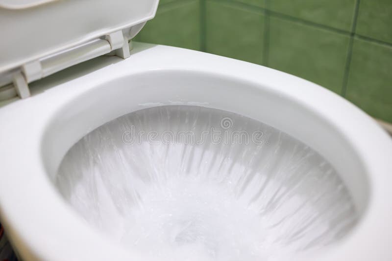 Flushing Lavatory Pan in Toilet Stock Image - Image of clean, toilet ...
