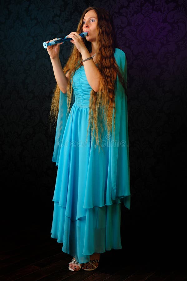 Flute player stock image. Image of fragile, design, fashionable - 14124677