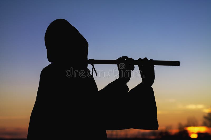 Flute Player Sunset Silhouette Stock Photo - Image of player, dusk ...